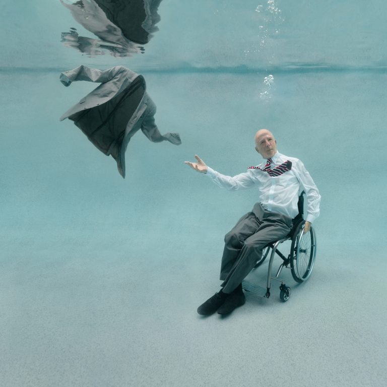 Artist Portrait of Empowered Disabled Man in a Wheelchair Underwater ...